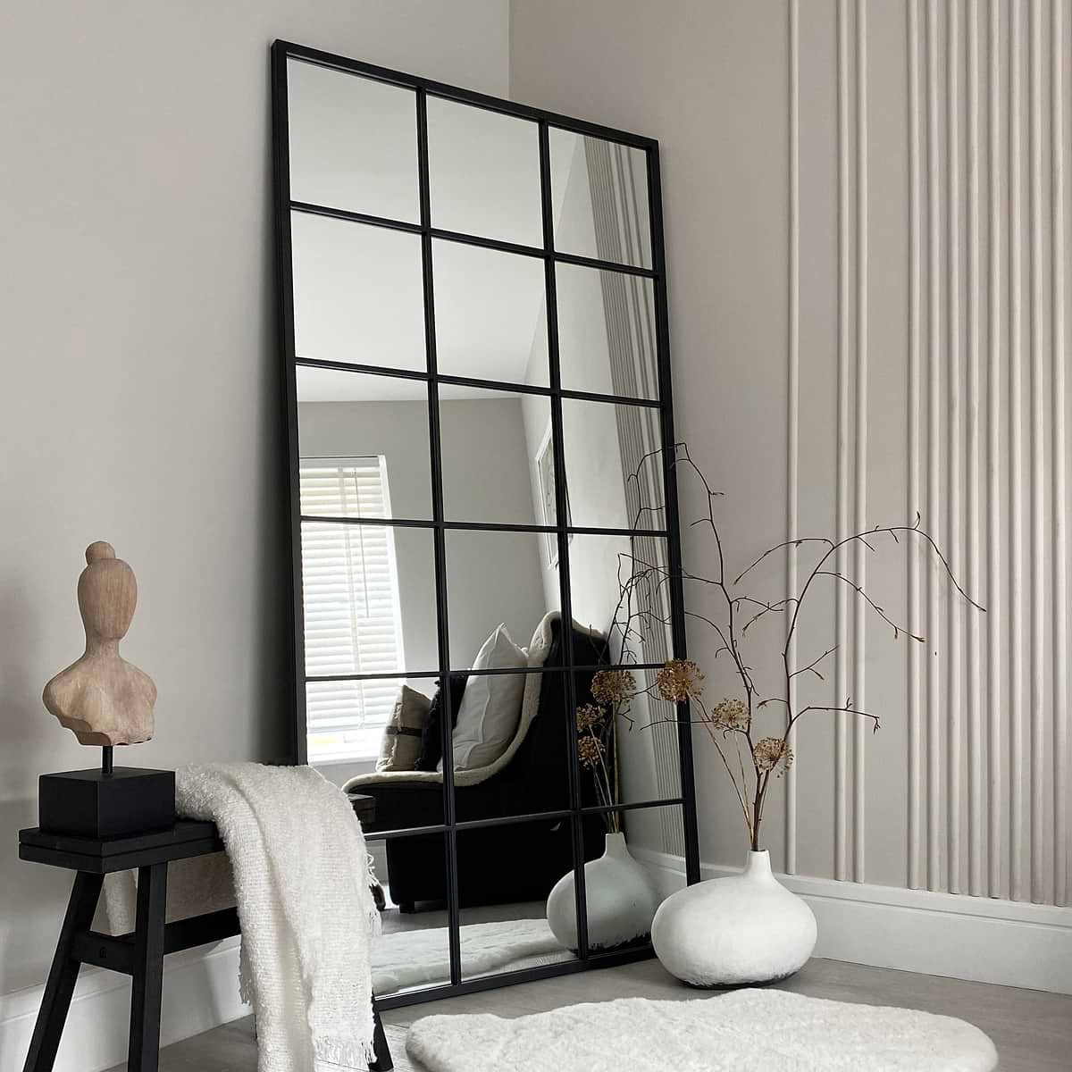 black window frame mirror