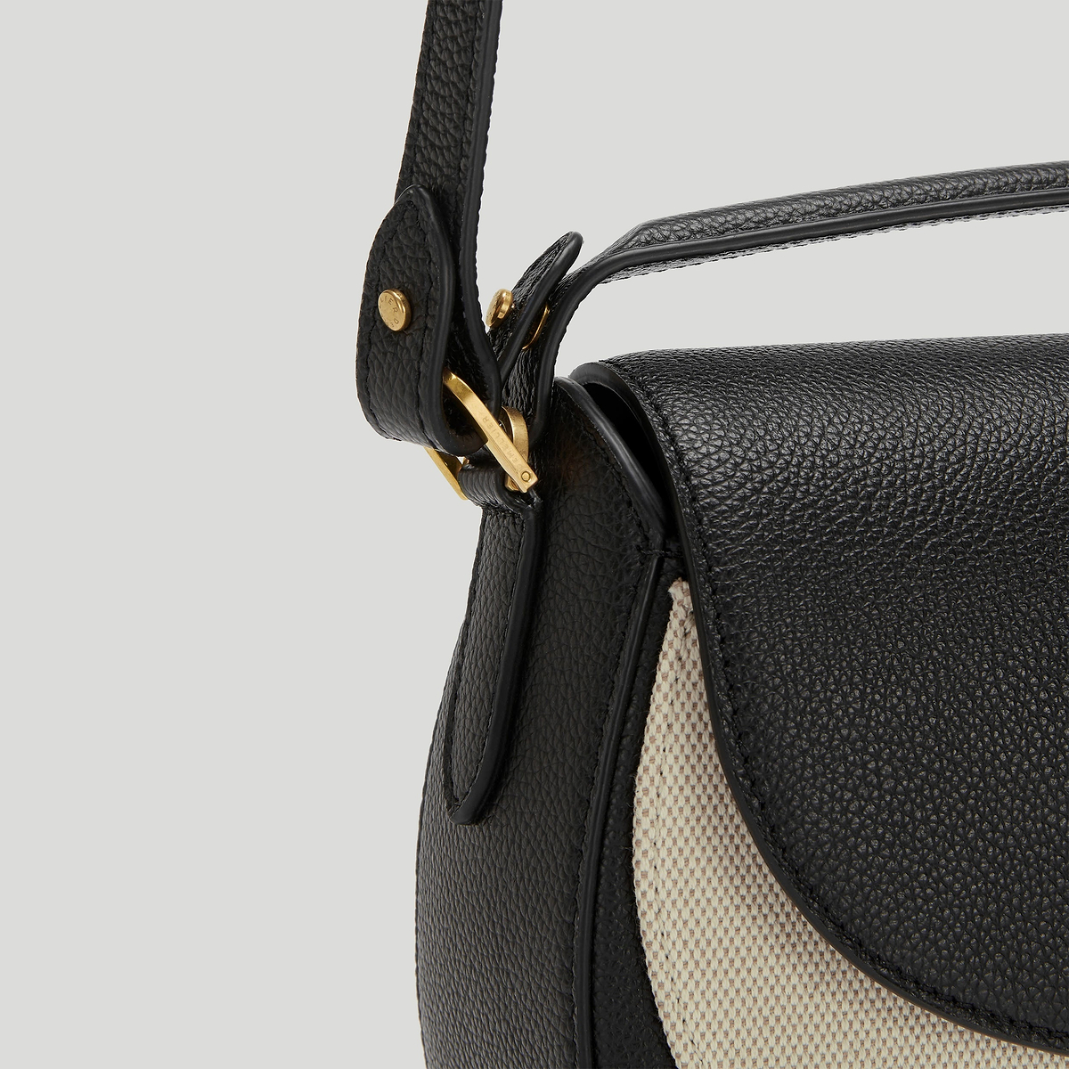 The Siena Saddle | Salt & Pepper Canvas Black Small Grain | DeMellier