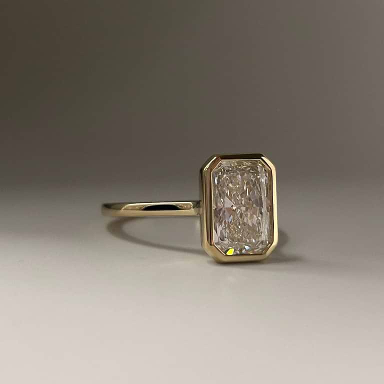 Emerald Cut Hidden Halo Wide Pave White Gold – Plum